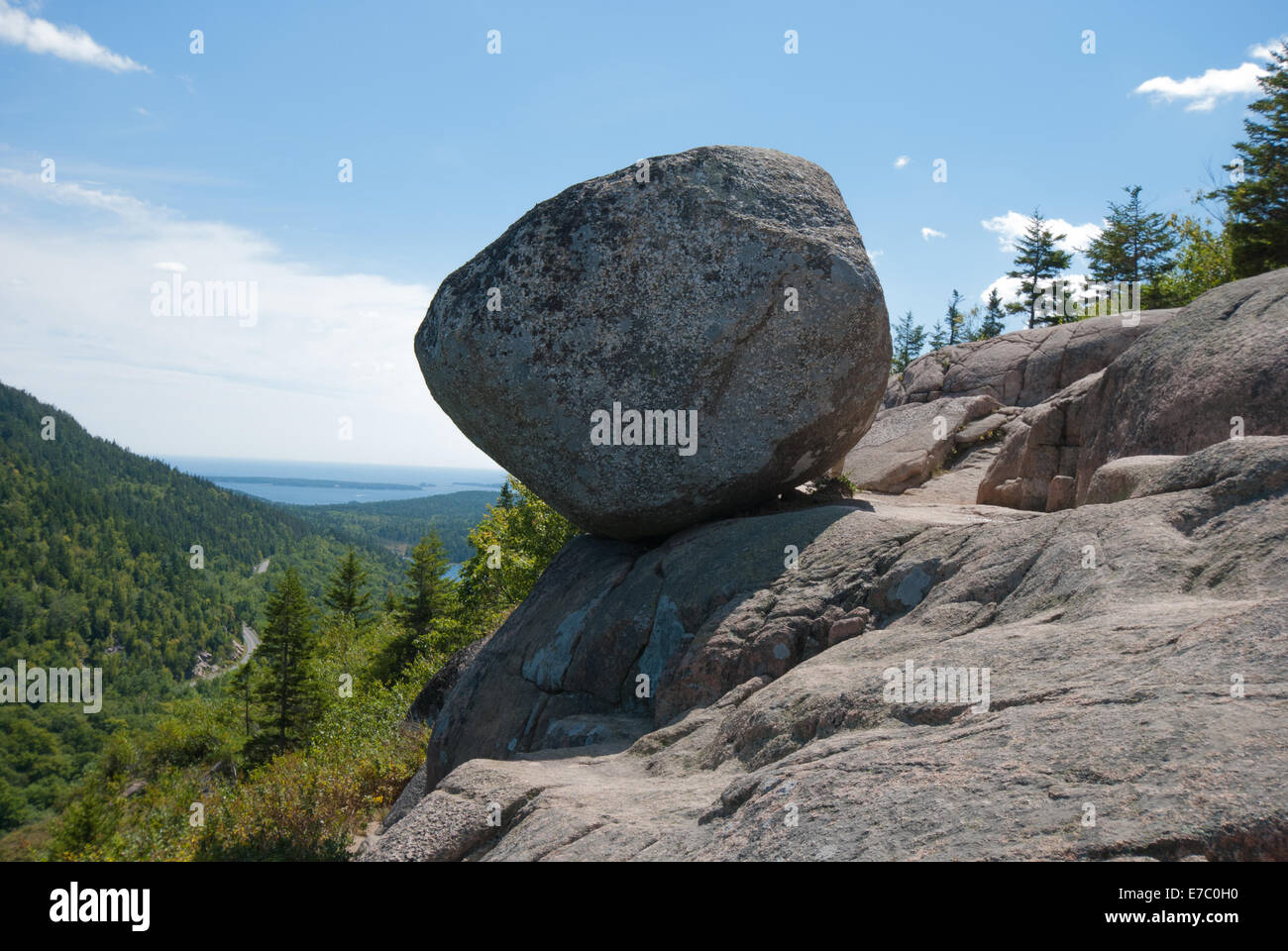 Bubble Rock left from migrating glaciers sits precariously in Acadia ...
