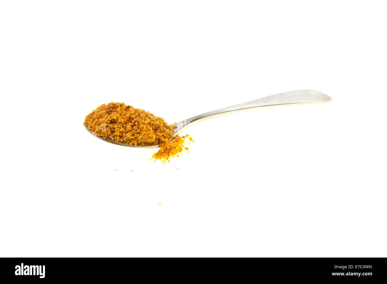 Spoon of raw sugar isolated in white background Stock Photo - Alamy