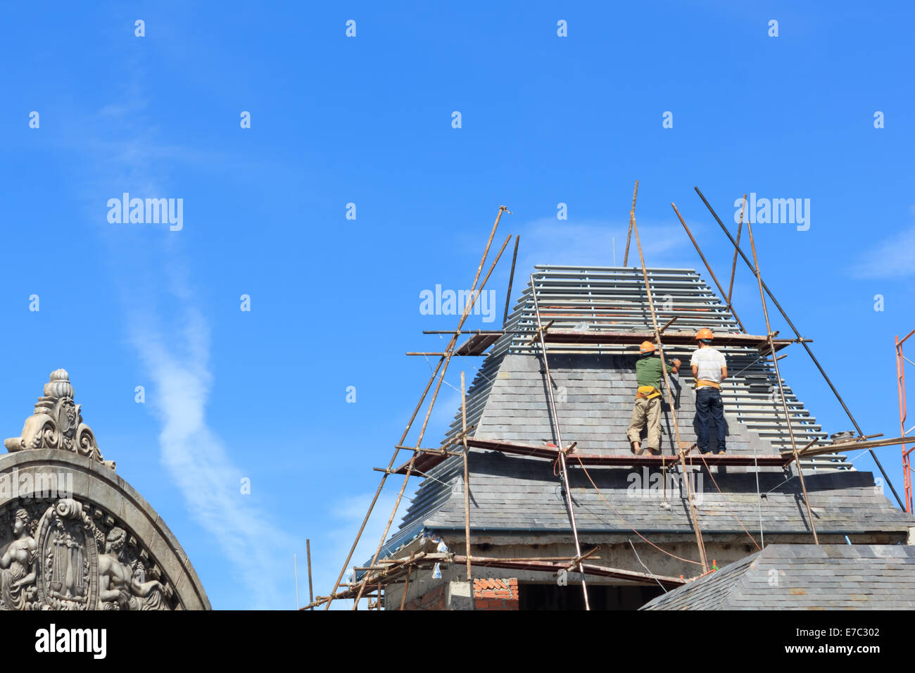 Workers are build towers Stock Photo - Alamy