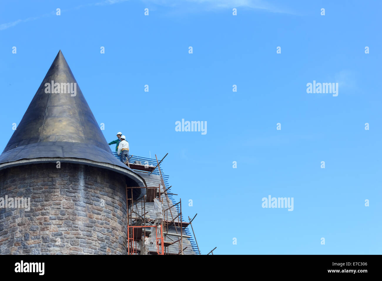 Workers are build towers Stock Photo - Alamy