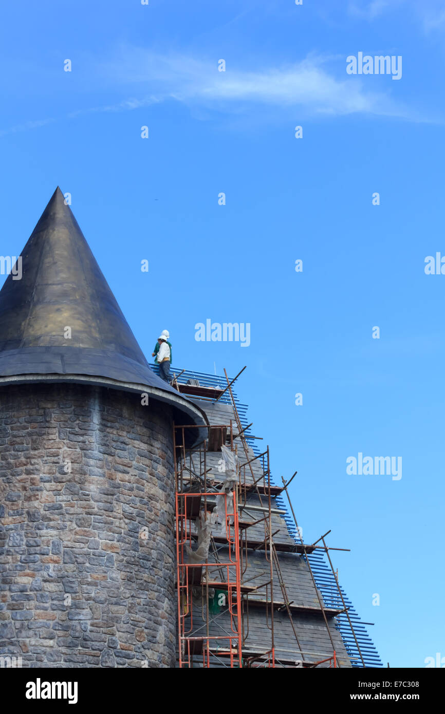 Workers are build towers Stock Photo - Alamy