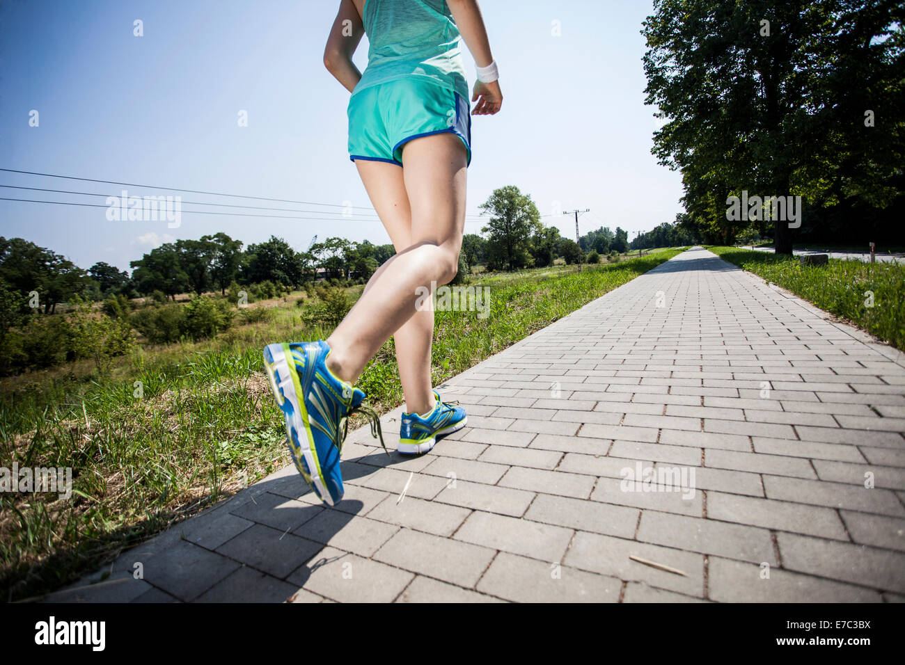Two pretty girls jogging in the morning Stock Photo - Alamy