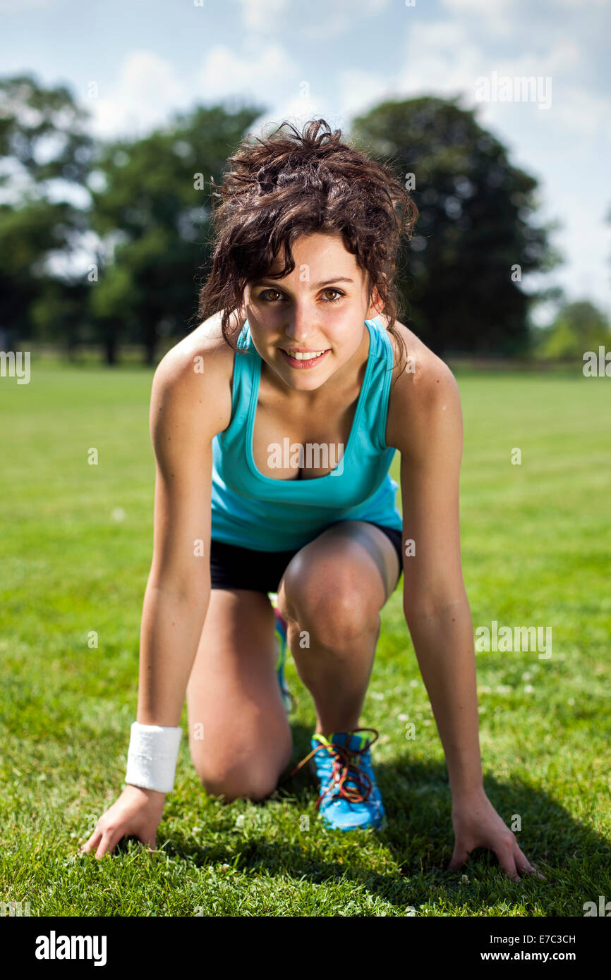 Sprinter start position on the track. Jogging sport Stock Photo - Alamy
