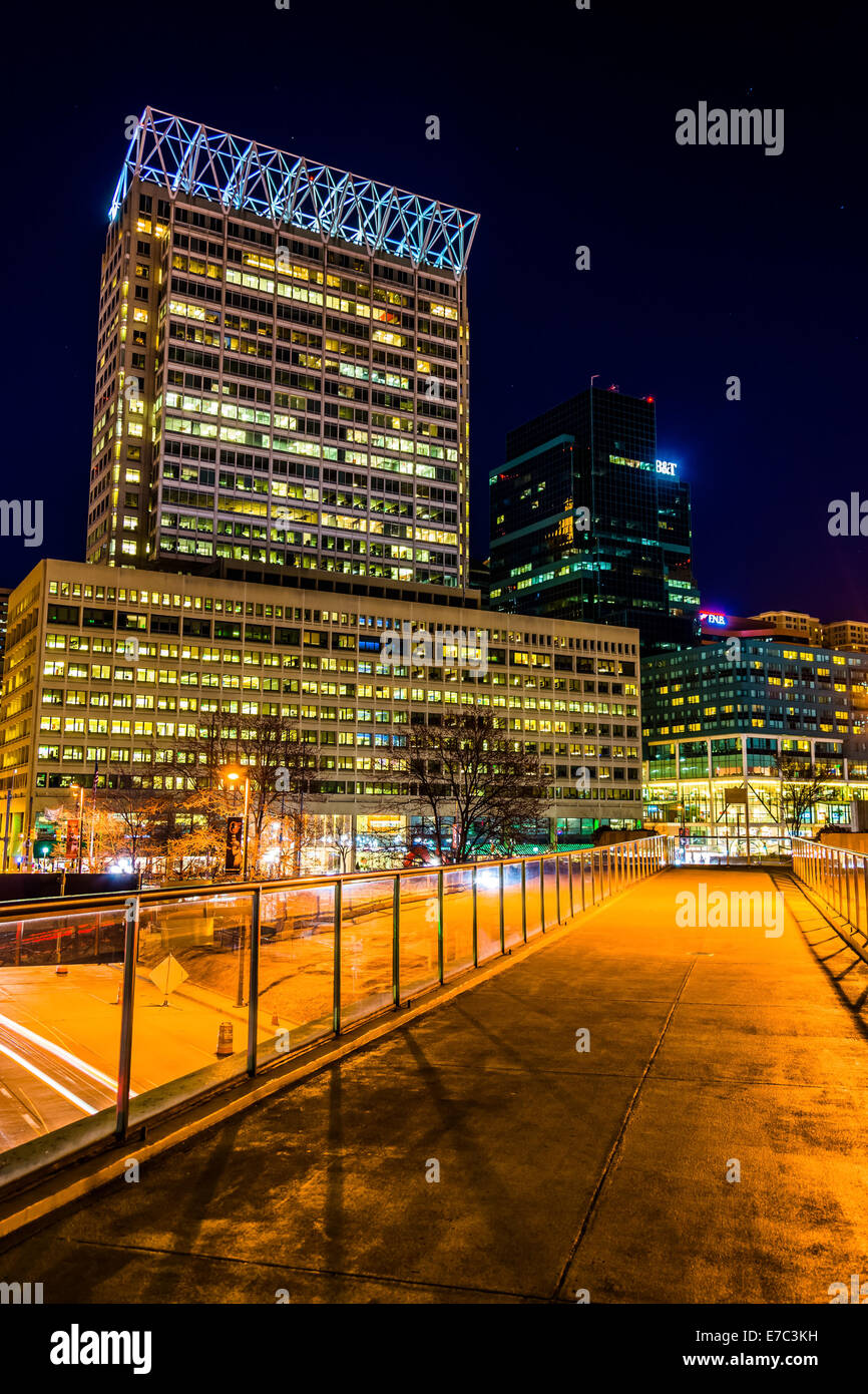 Elevated walkway and modern skyscrapers at night in Baltimore, Maryland ...