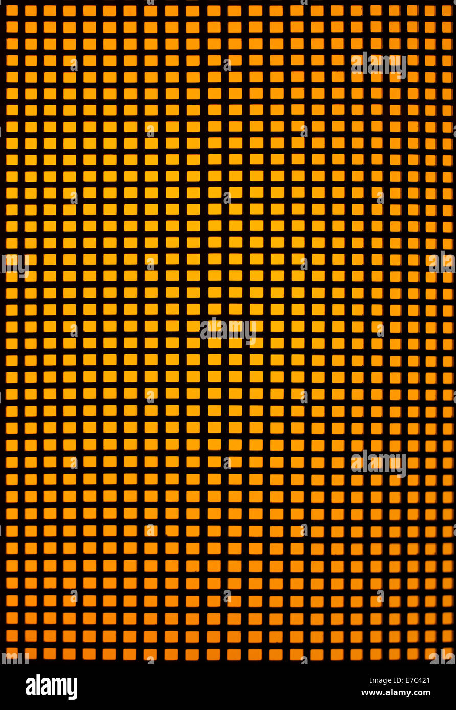Black hole grid with yellow backlight Stock Photo - Alamy