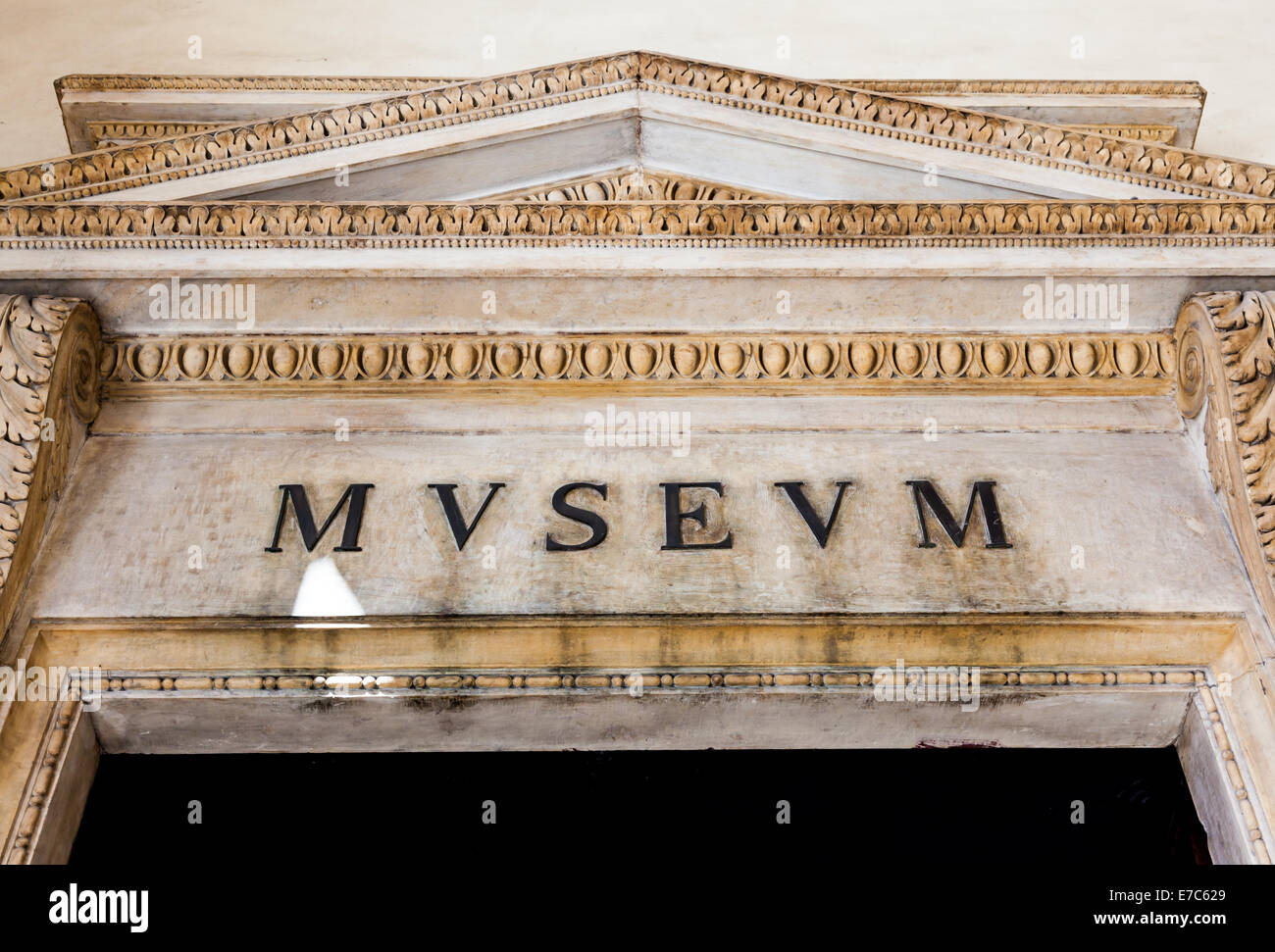 Entrance of an ancient museum, letters on original marble Stock Photo ...