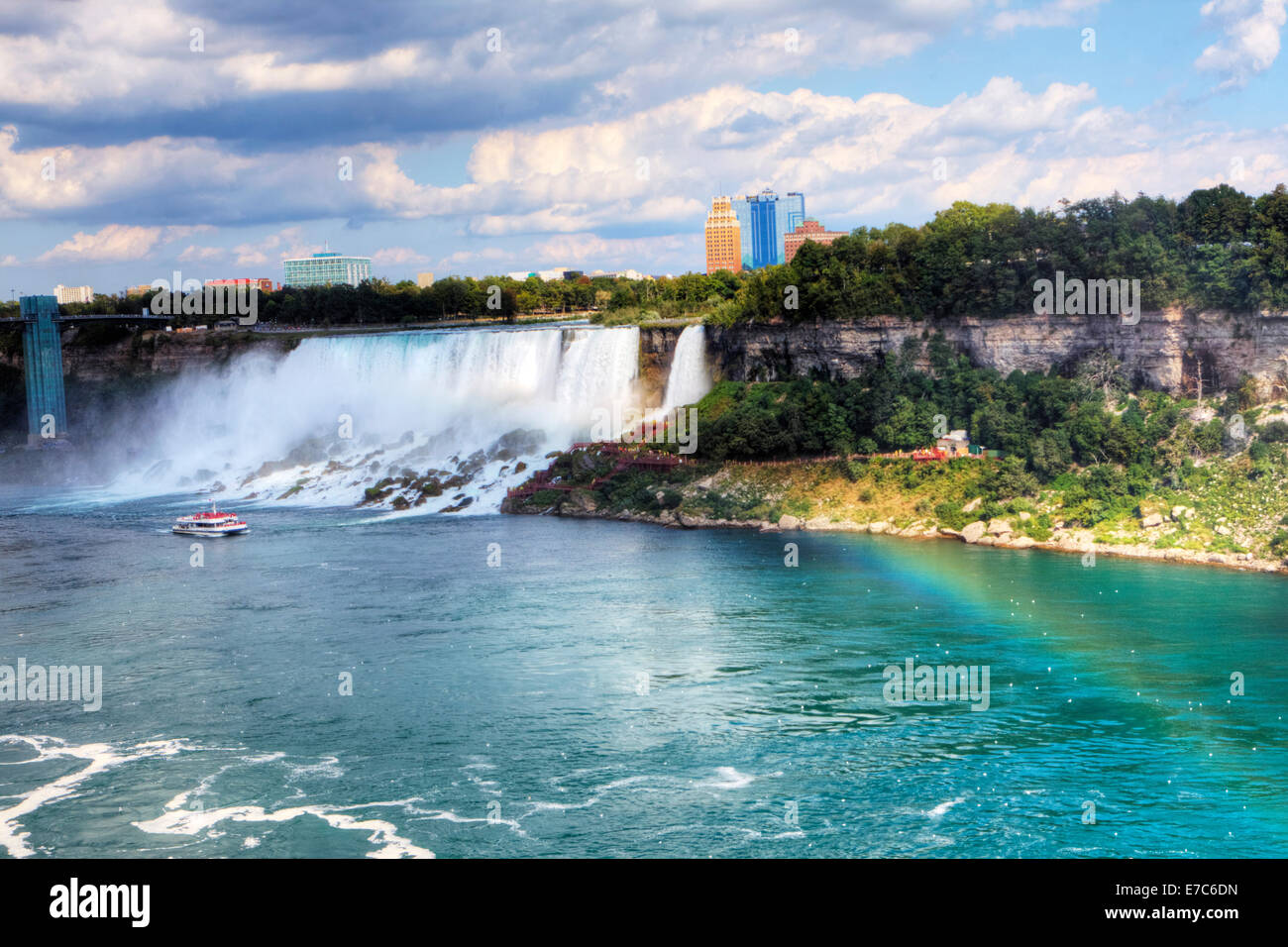 A rainbow in front of the American Falls at Niagara Falls Stock Photo ...