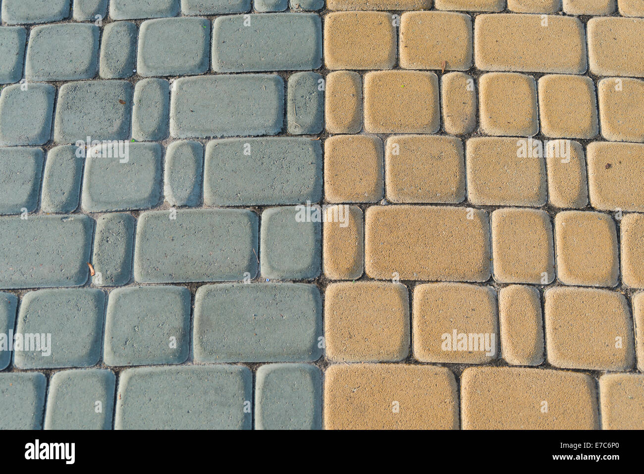 nice floor of grey and yellow bricks in a square Stock Photo - Alamy