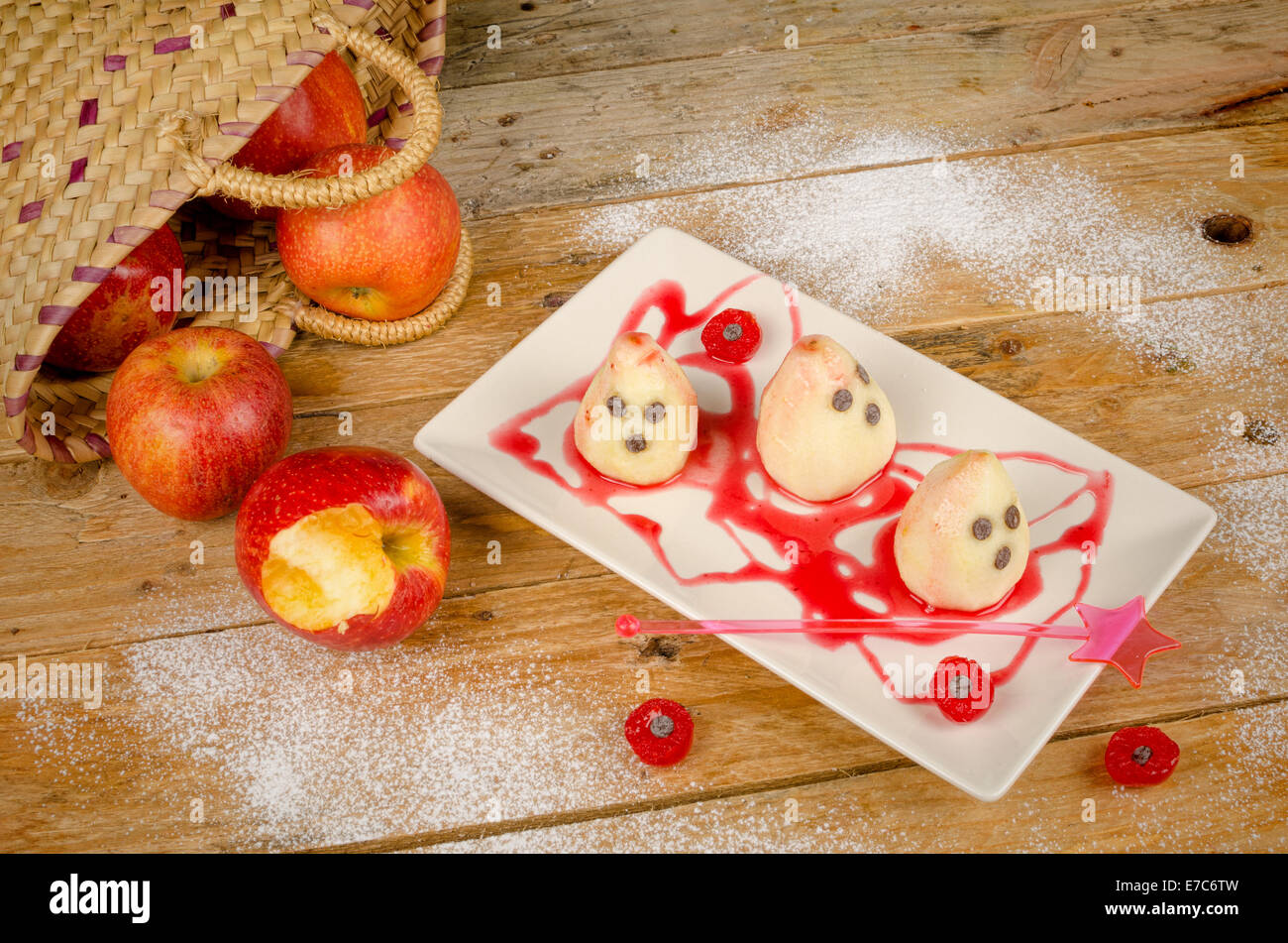 Pear ghosts, a spooky and healthy kid Halloween party dessert Stock ...