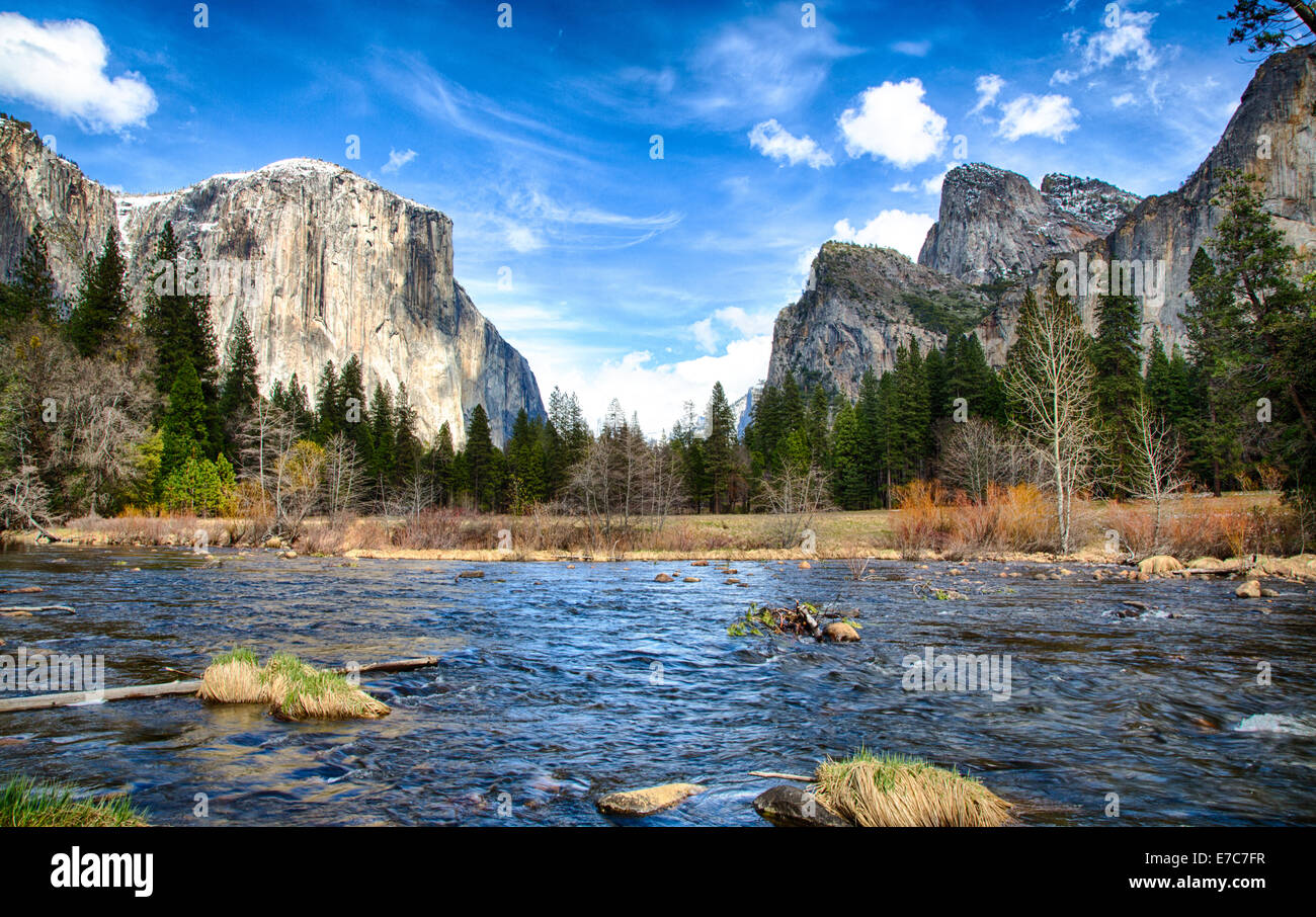 El Capitan towers above the valley floor. View from the Merced River ...