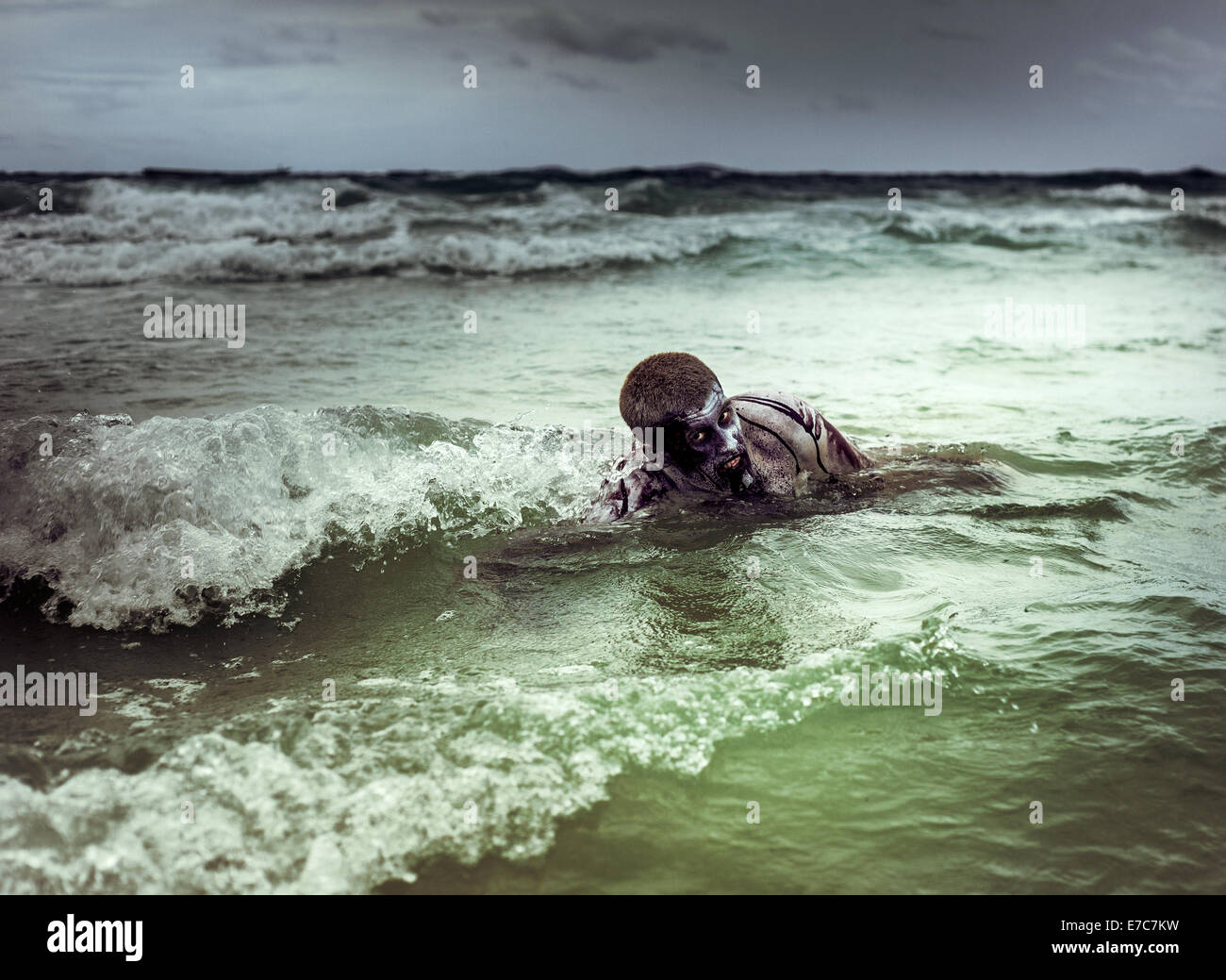 Dead human male body on beach hi-res stock photography and images - Alamy