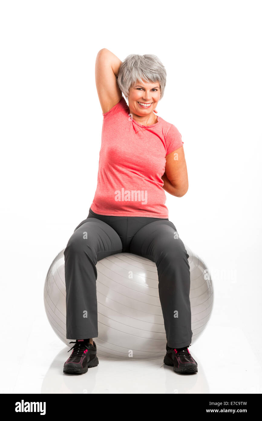 Happy fitness old woman making exercises with a PIlates ball Stock ...