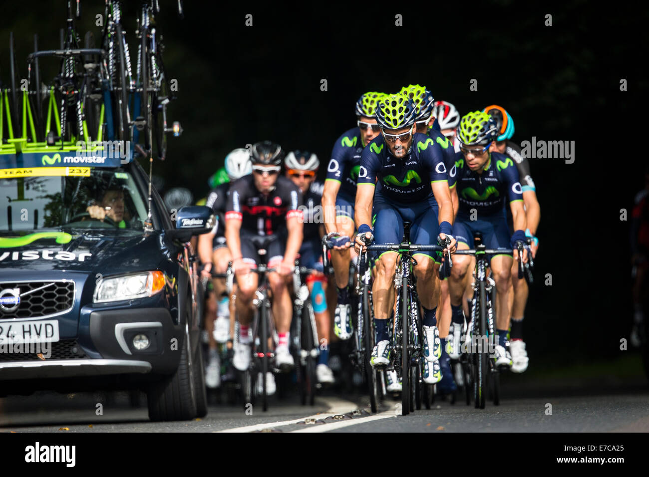 Fernhurst, UK. 13th Sep, 2014. The Movistar team car pulls alongside ...