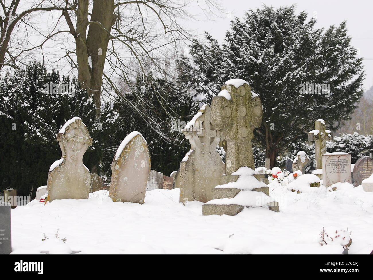 Graveyard in winter Stock Photo - Alamy