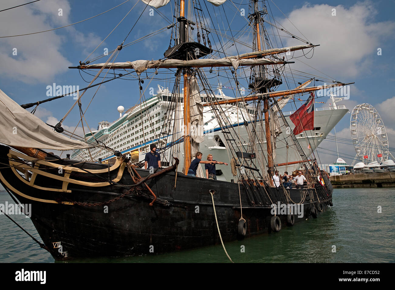 Tall ship Phoenix docks in front of the Adventure of the Seas cruise ...