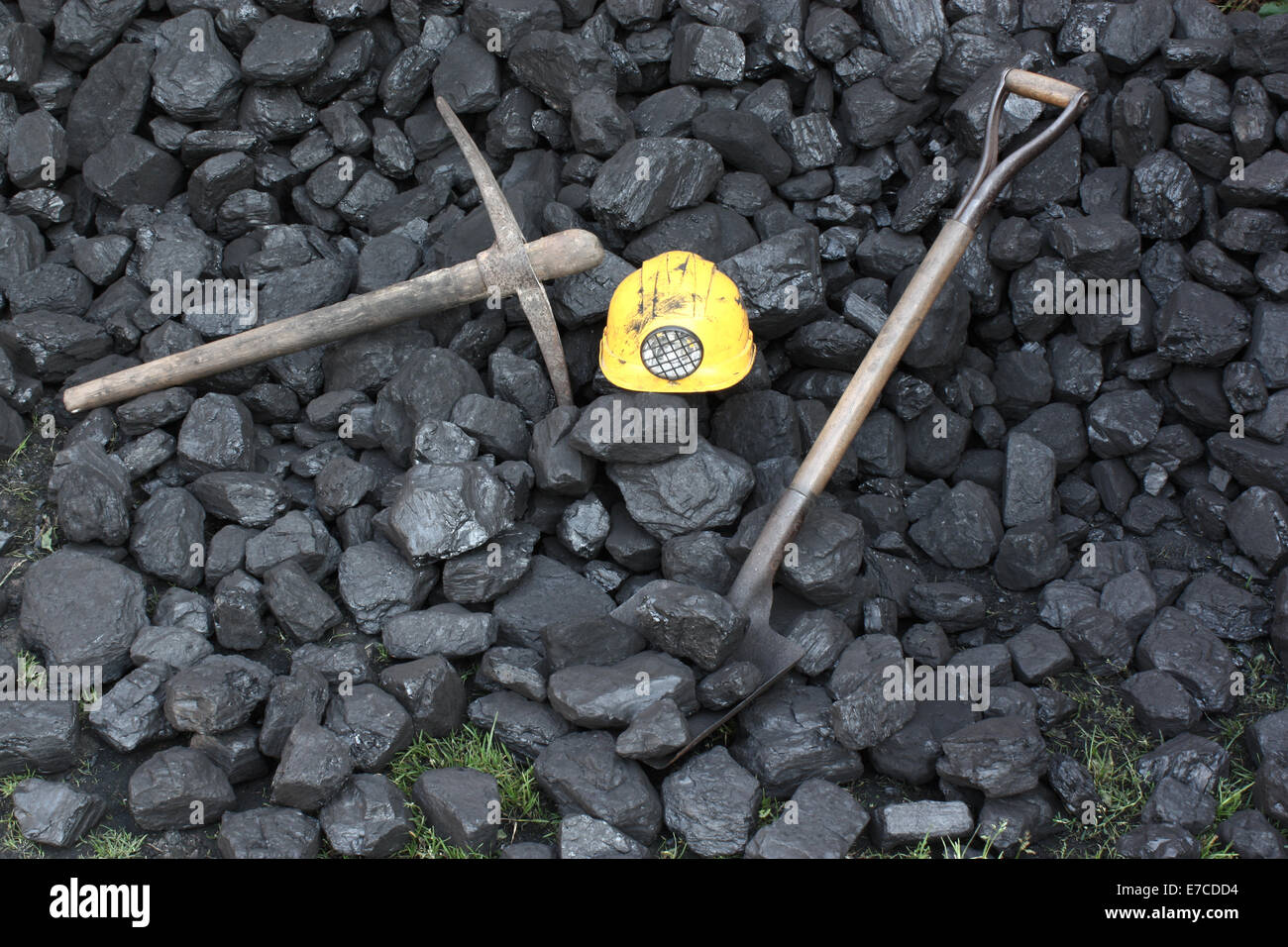 Mining tools on a background of coal Stock Photo - Alamy