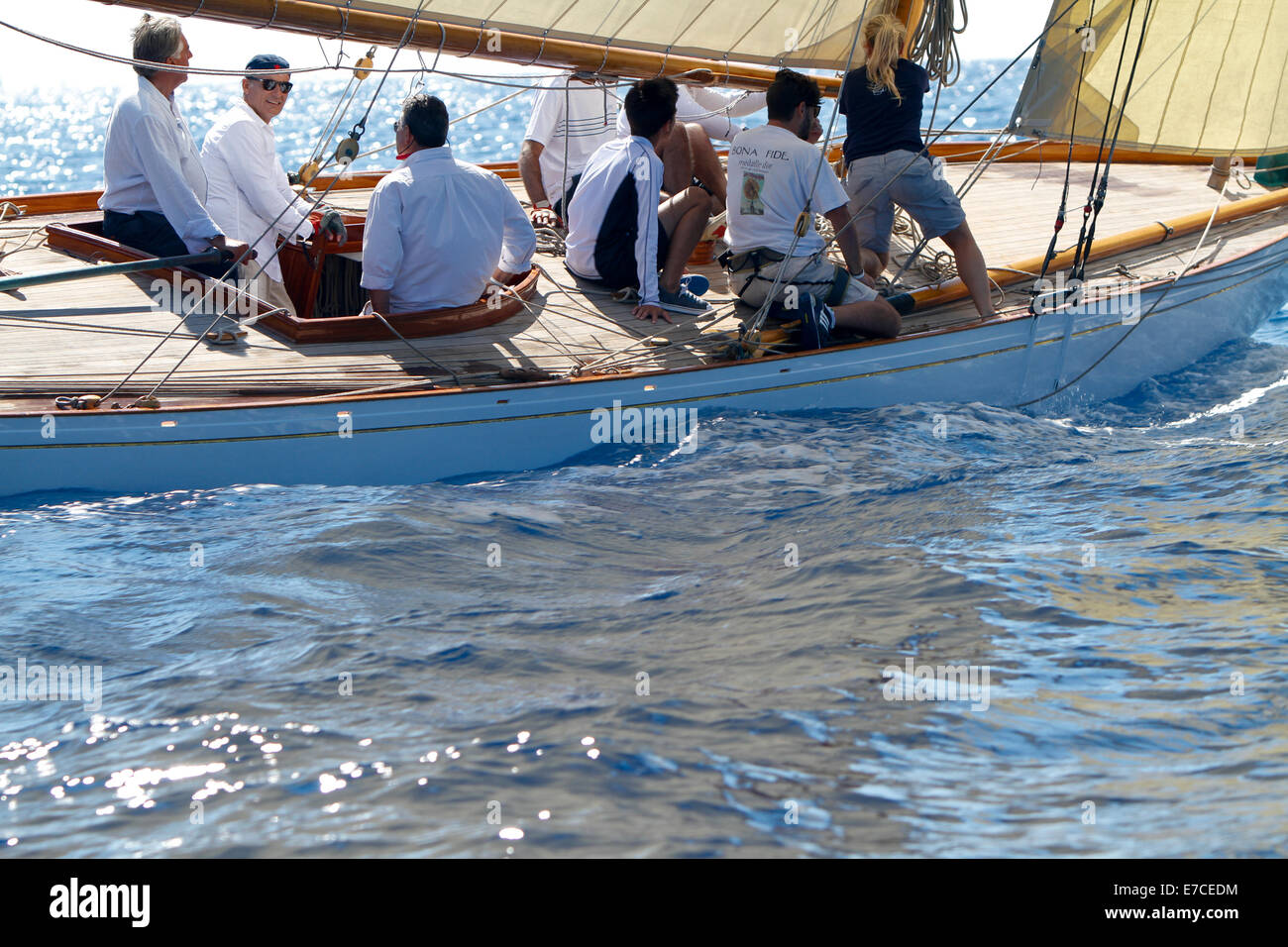 Imperia, Italy. 13th September 2014. Crew members sailing a yacht ...