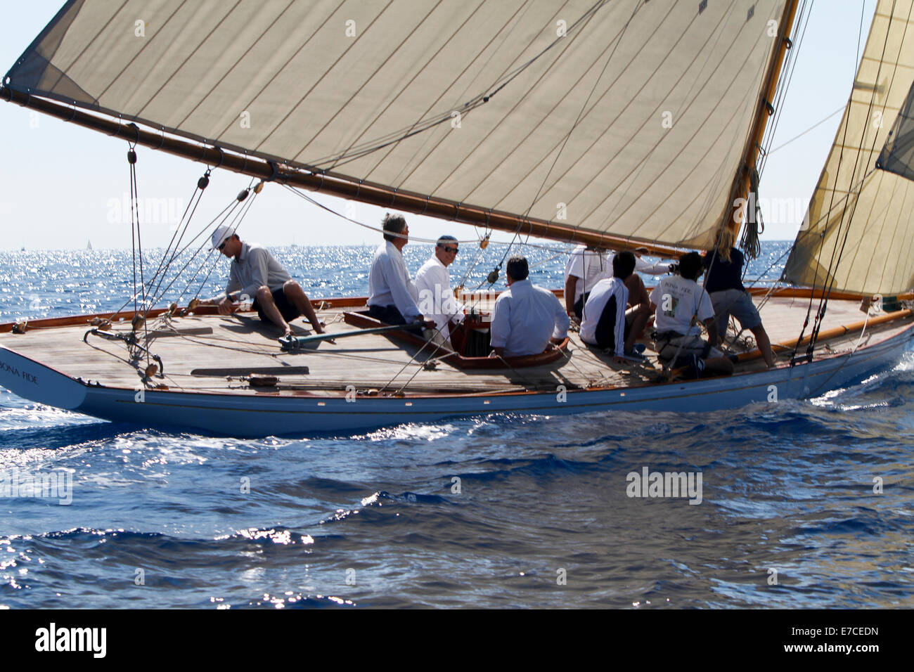 Imperia, Italy. 13th September 2014. Crew members sailing a yacht ...