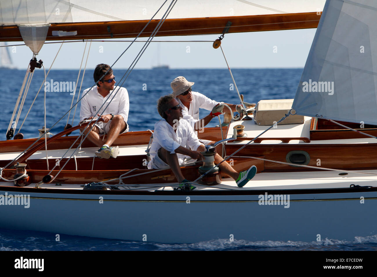 Imperia, Italy. 13th September 2014. Crew members sailing a yacht ...