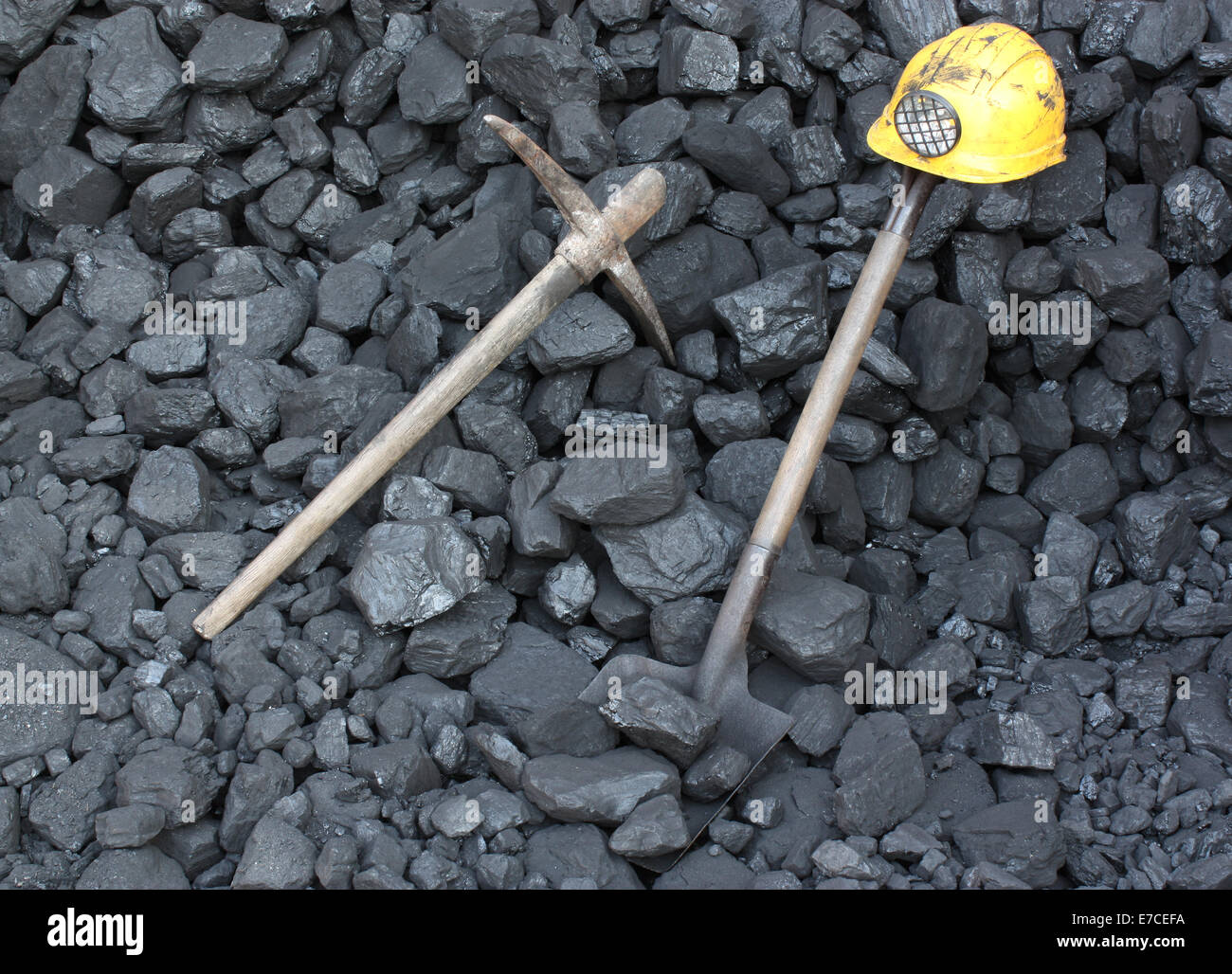 Mining tools on a background of coal Stock Photo - Alamy