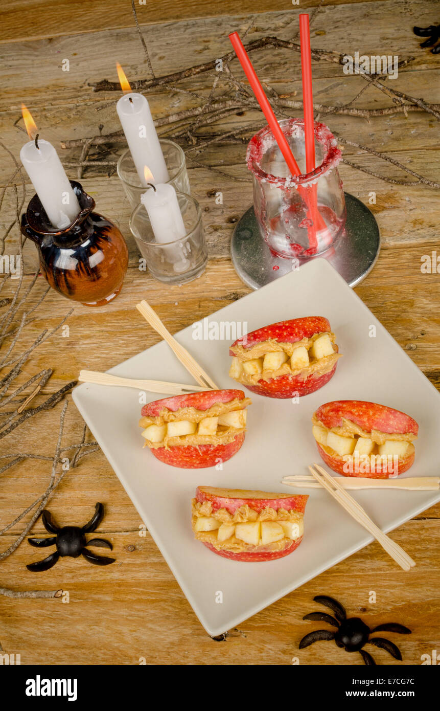Halloween kid party dessert, spooky apple dentures Stock Photo - Alamy