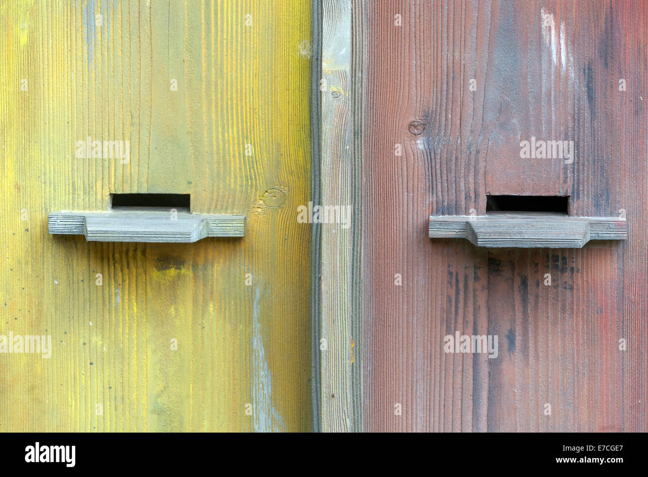 Old hives apiaries, hole, colored beehives, rural wooden beehive ...