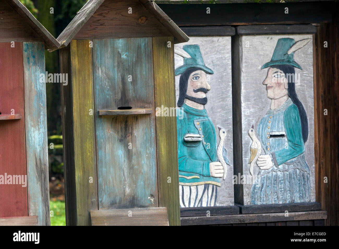 Old hives apiaries, colored beehives, rural wooden beehive, painted ...