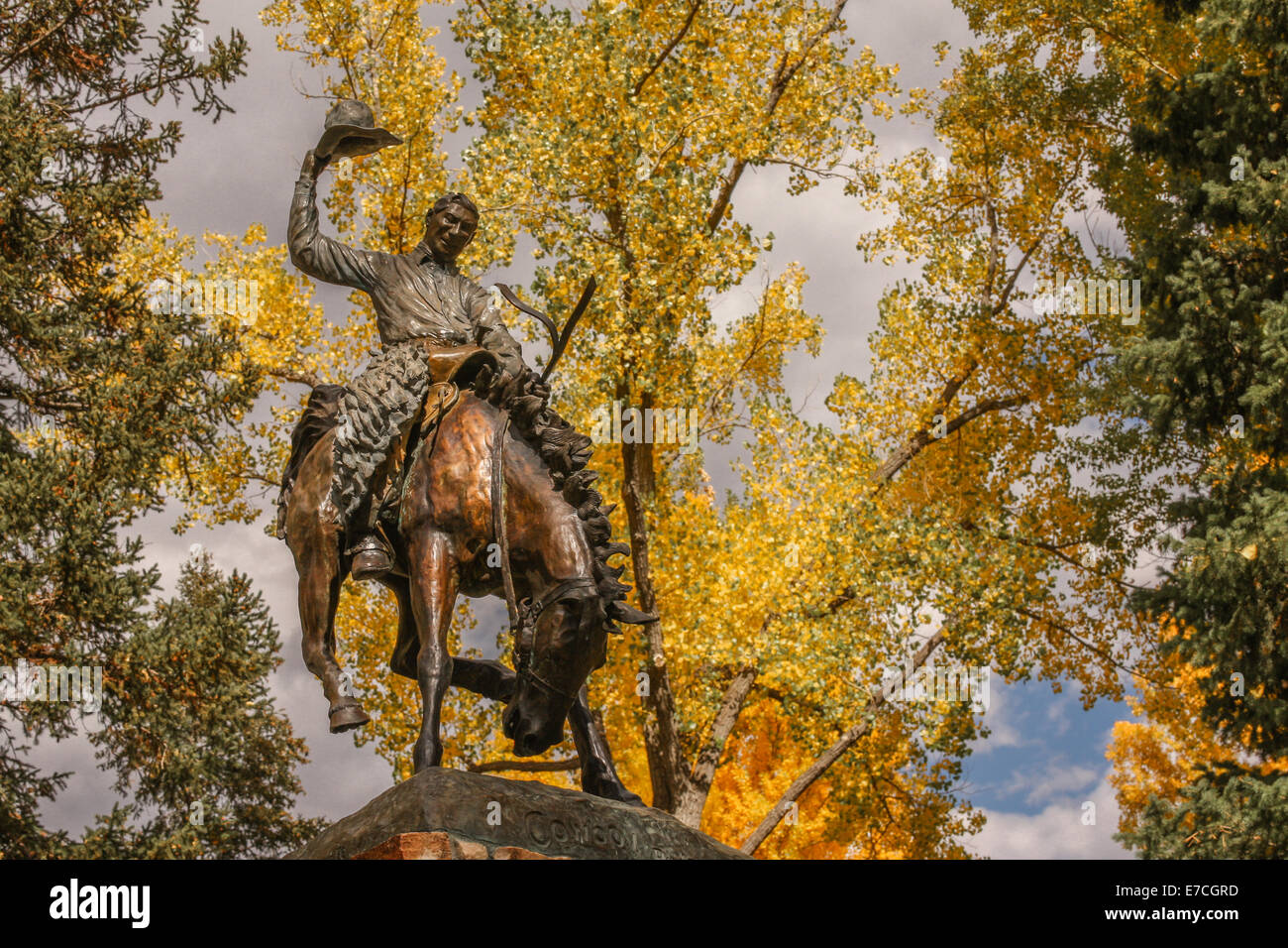 Bronze cowboy memorial statue, Jackson Hole, Wyoming, USA Stock Photo ...
