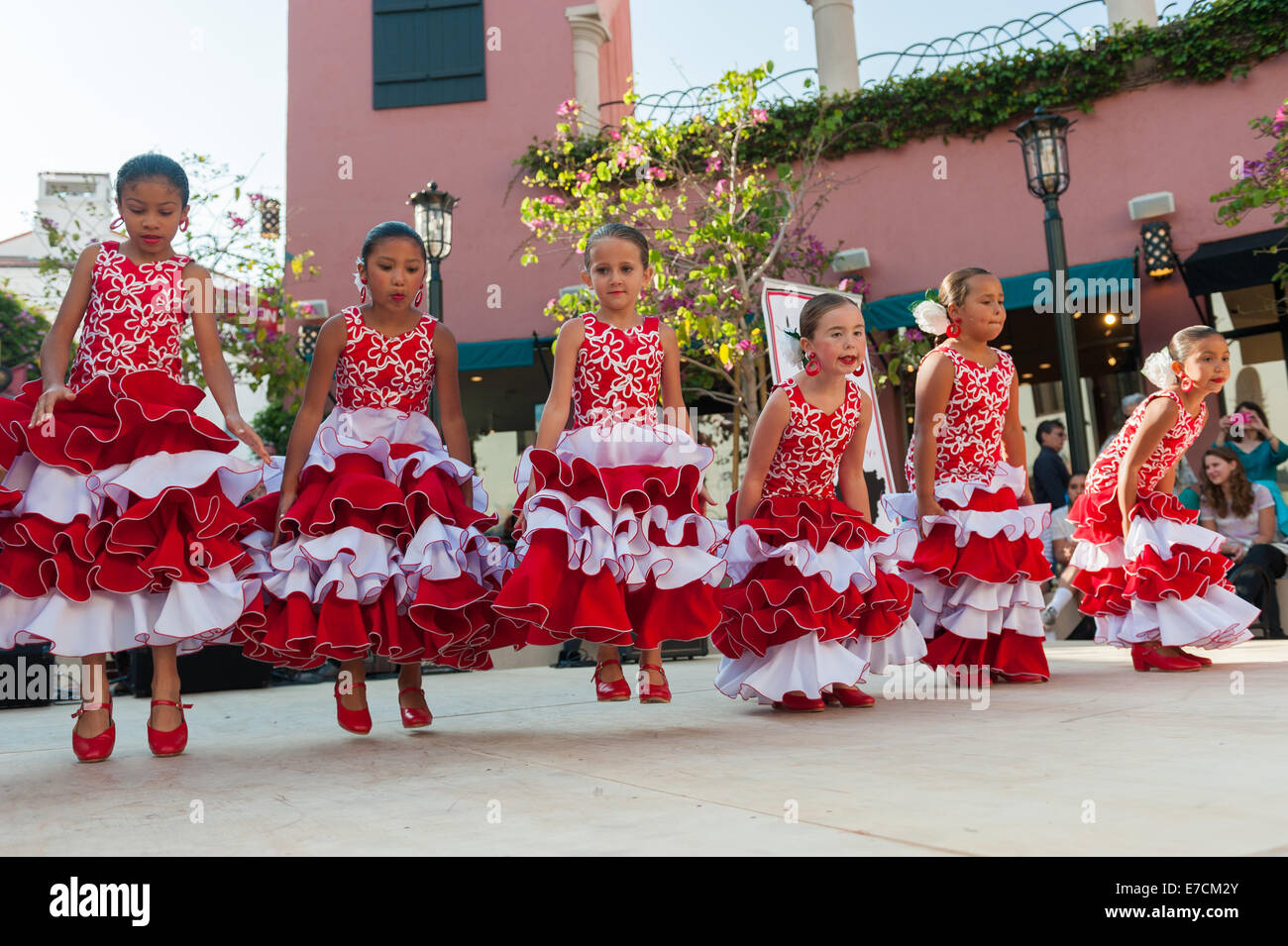 A group of young girls dance on a stage at Paseo Nuevo shopping mall in ...