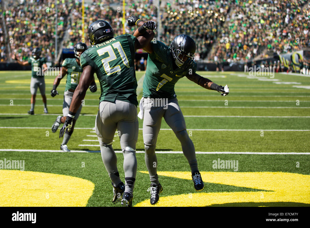 Sept. 13, 2014 - ROYCE FREEMAN (21) and KEANON LOWE (7) celebrate ...