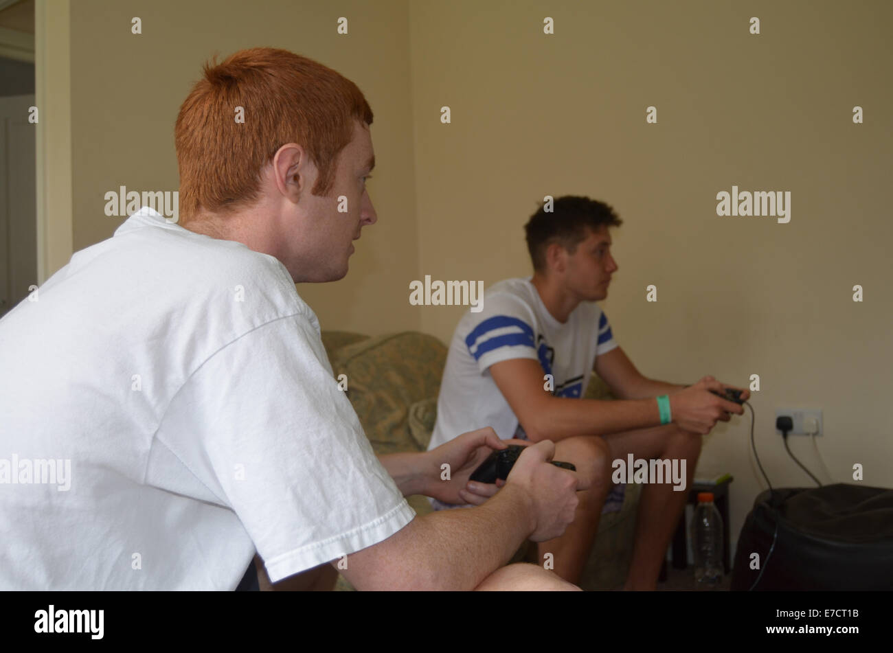 Students playing x-box in their student house, UK 2014 Stock Photo - Alamy