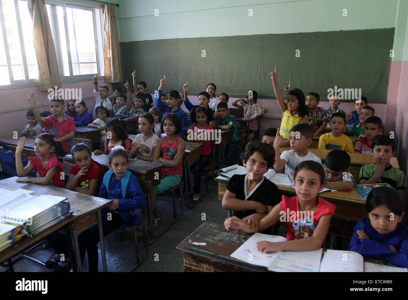 Damascus, Syria. 13th Sep, 2014. Syrian pupils are seen inside a ...