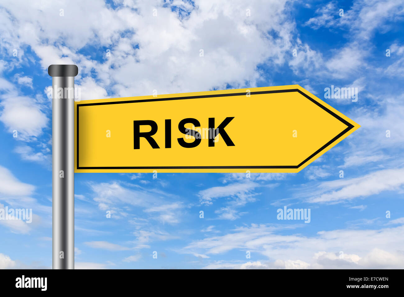 risk words on yellow road sign on blue sky Stock Photo - Alamy