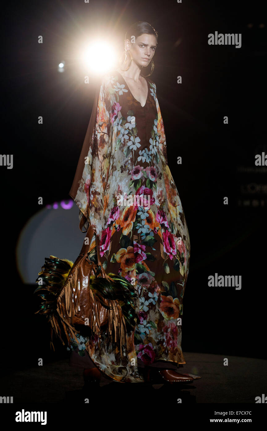 Models pose on the catwalk during the Roberto Verino Fashion Show at ...