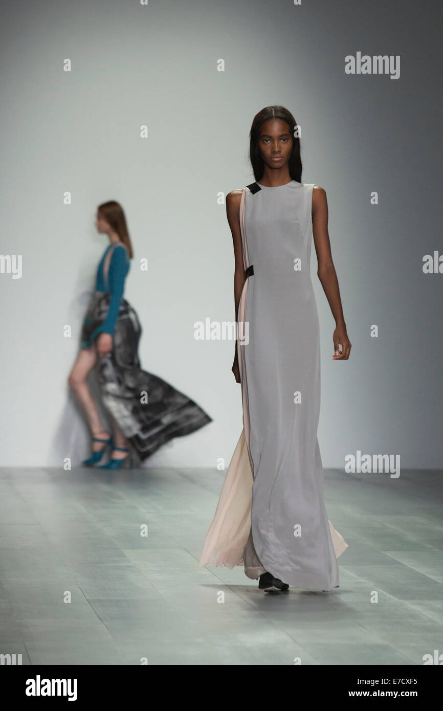 London, UK. 14 September 2014. A model walks the runway at the Marios ...