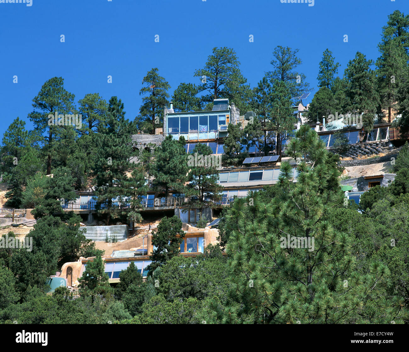 Earthships on a hillside near Taos, New Mexico, USA. Part of the R.E.A ...