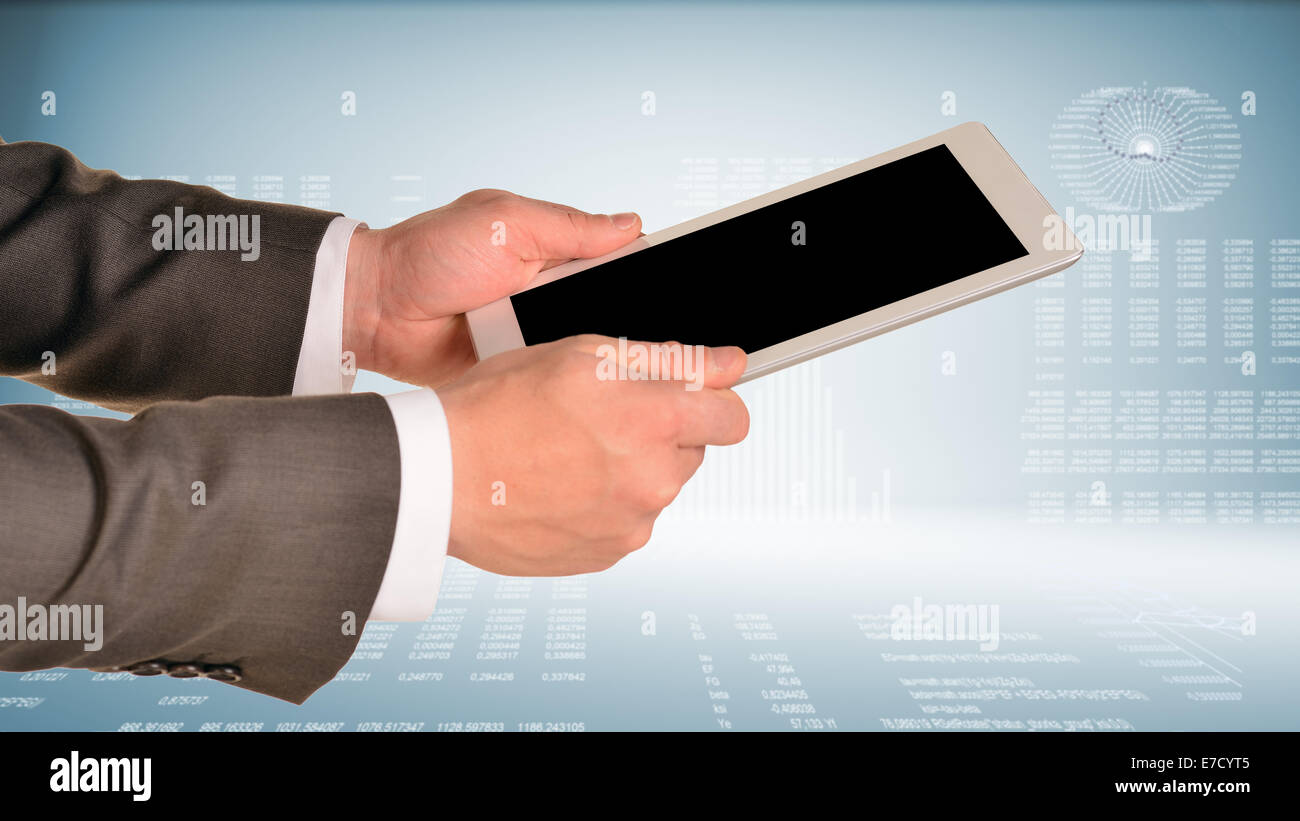 Two hands using tablet pc Stock Photo - Alamy