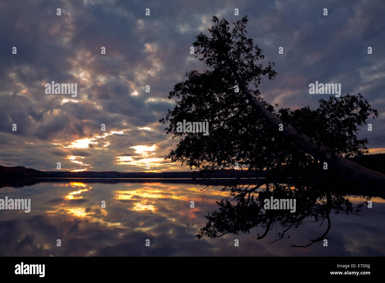 Sunset over the lake Stock Photo - Alamy