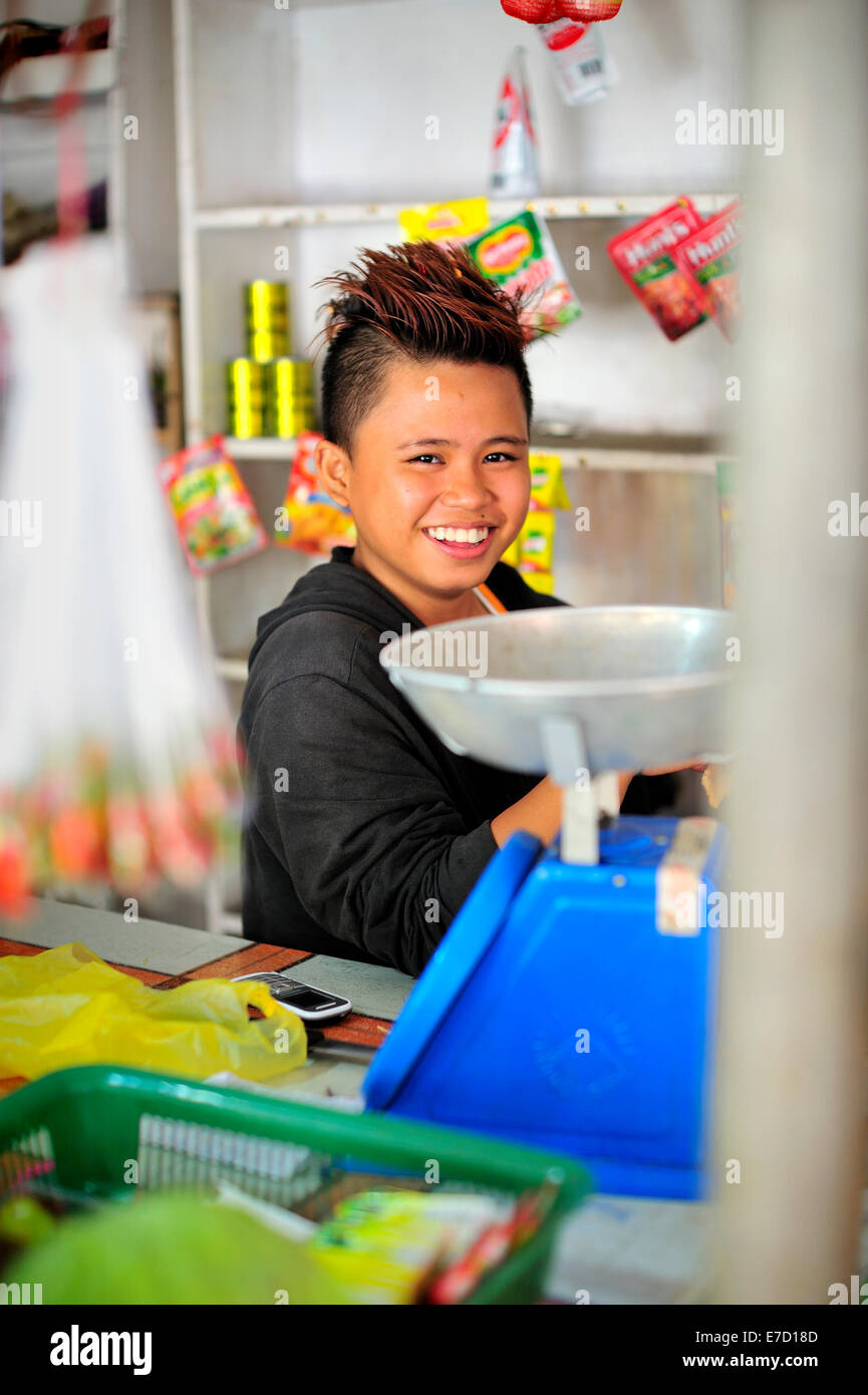 Filipino boy helping in Lahug fresh food market Cebu City Philippines ...