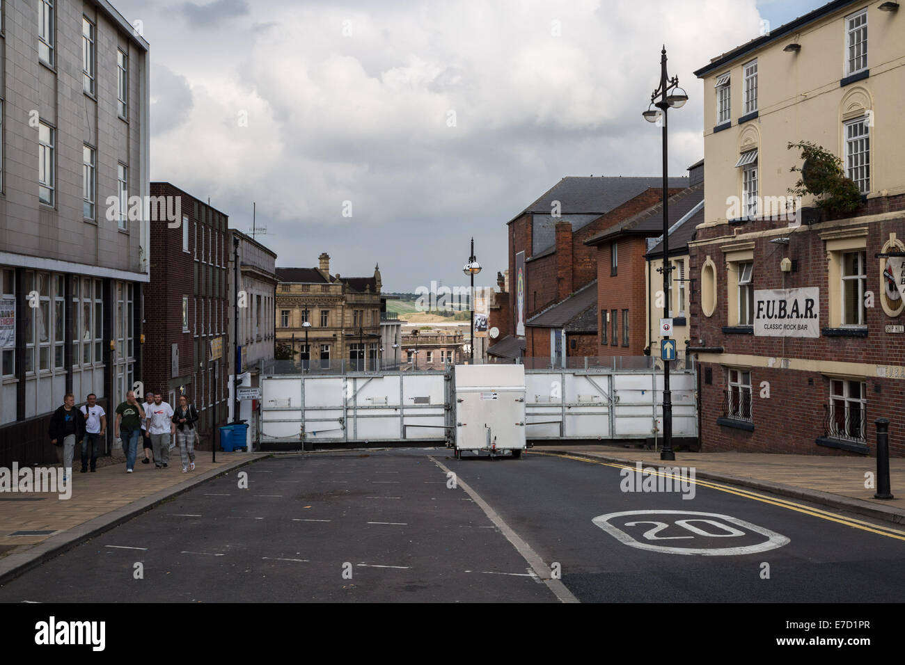 UK. 13th Sept, 2014. Police steel crowd control barrier in Rotherham ...