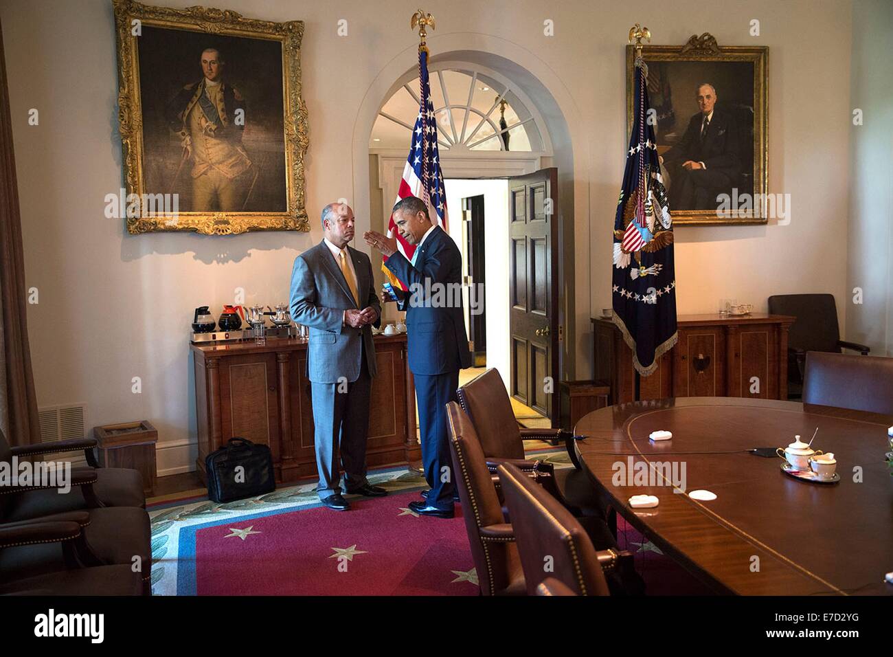 US President Barack Obama talks with Homeland Security Secretary Jeh ...