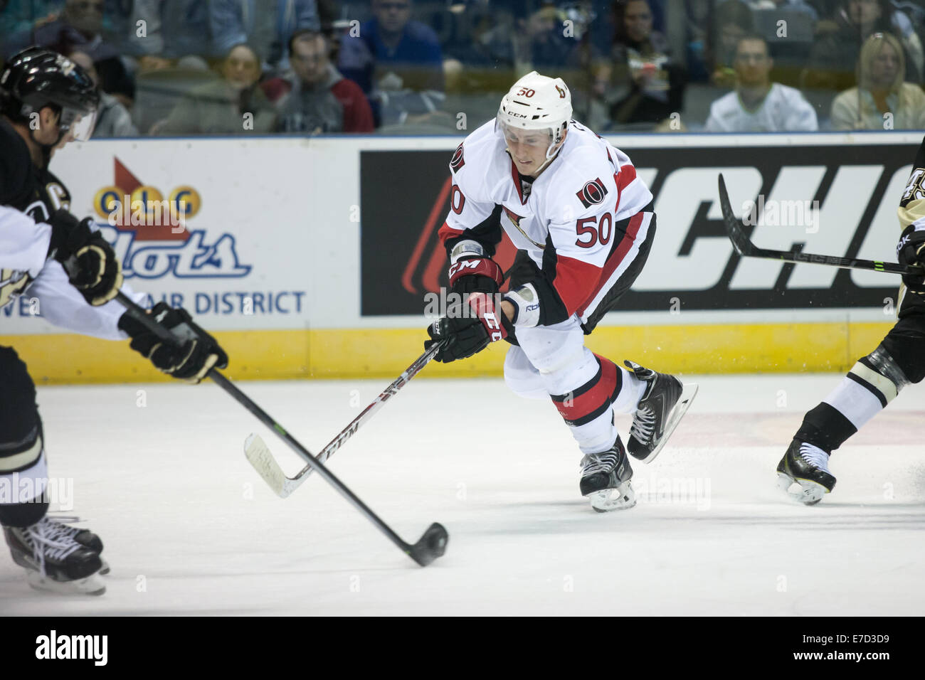 London, Ontario, Canada. 13th September, 2014. Jakub Culek (50) chases ...