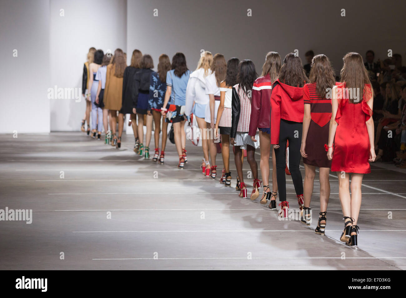 London, UK. 14 September 2014. Models walk the runway at the finale of ...