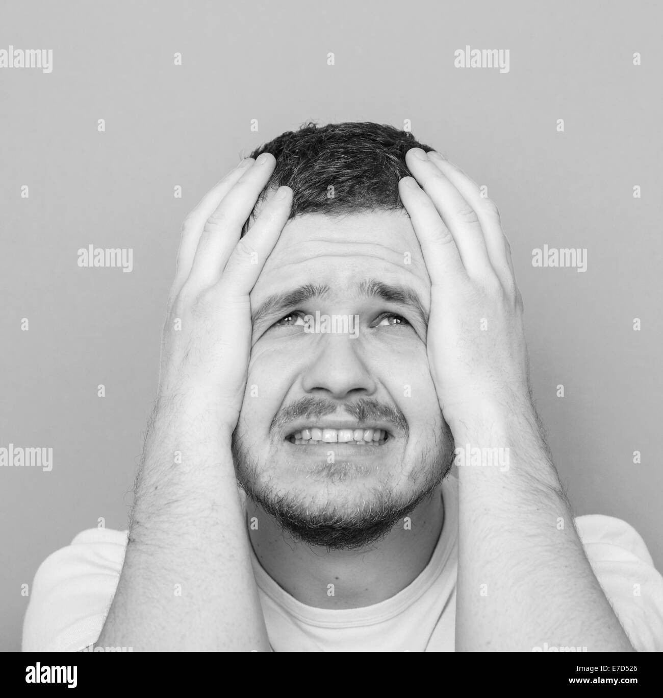 Portrait of sad man looking up - Monocrome or black and white portrait ...
