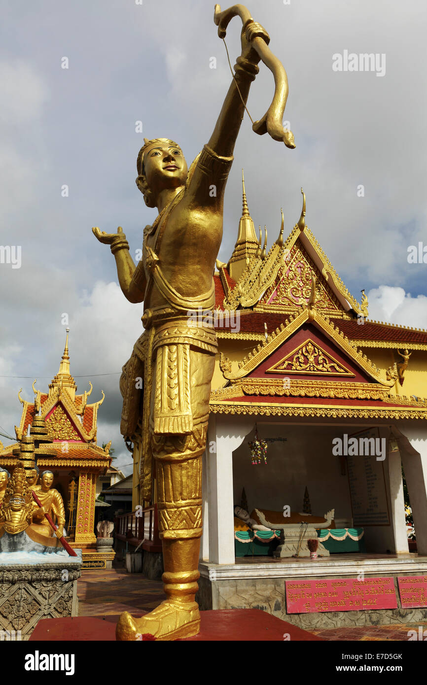 Golden statue of an archer and temples at Wat Dey Dos, Kampong Cham ...
