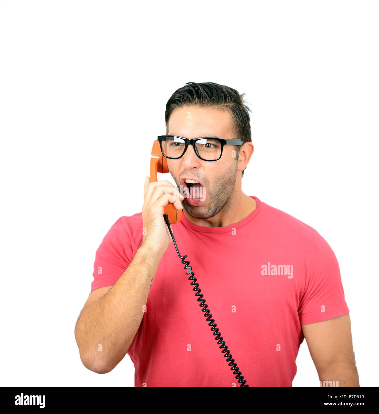 Portrait of young man yelling at phone against white background Stock ...