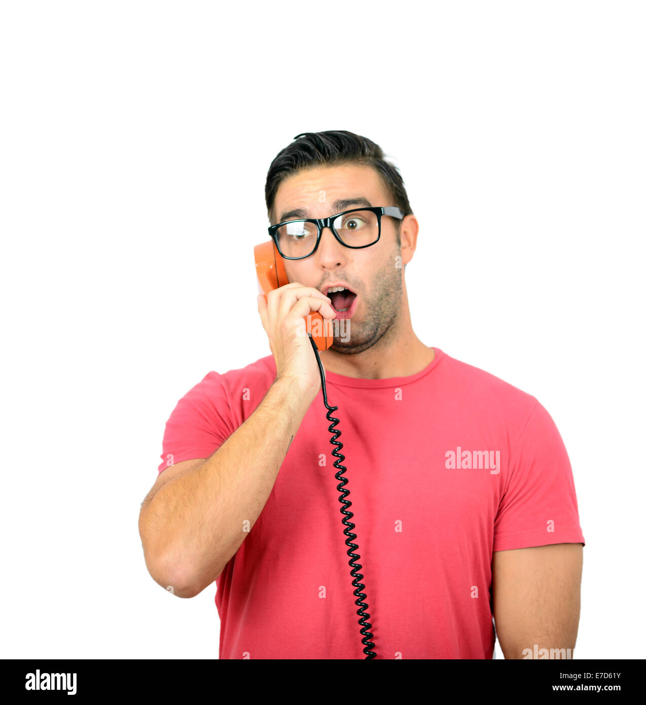 Portrait of young man yelling at phone against white background Stock ...