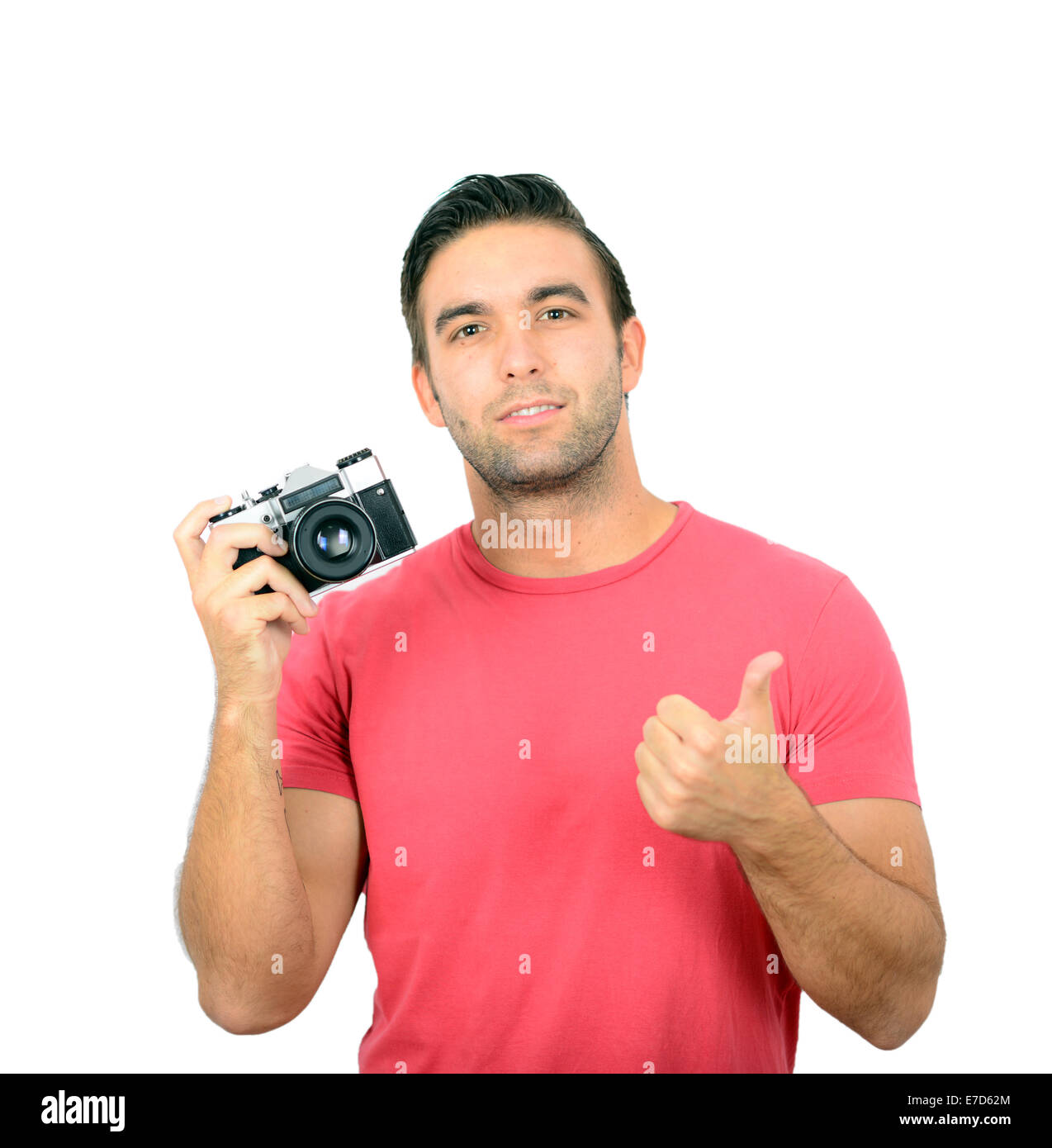 Young man using a retro camera against white background Stock Photo - Alamy