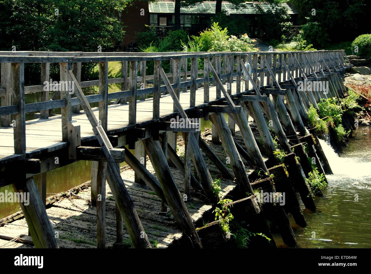 SLEEPY HOLLOW, NY: The long wooden mill pond bridge spans the pond ...