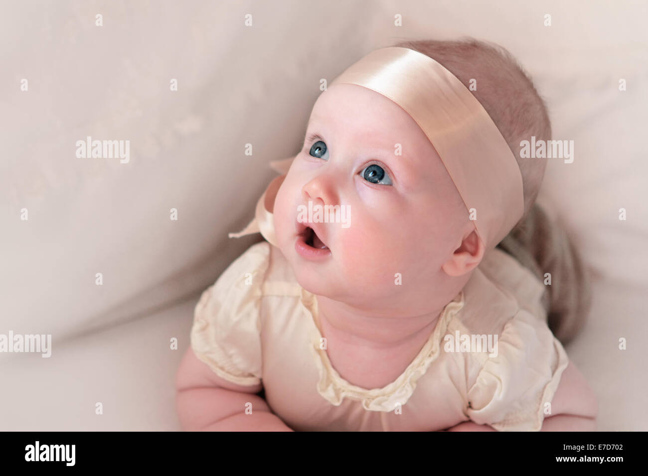 Beautiful small kid girl in pink tone Stock Photo - Alamy